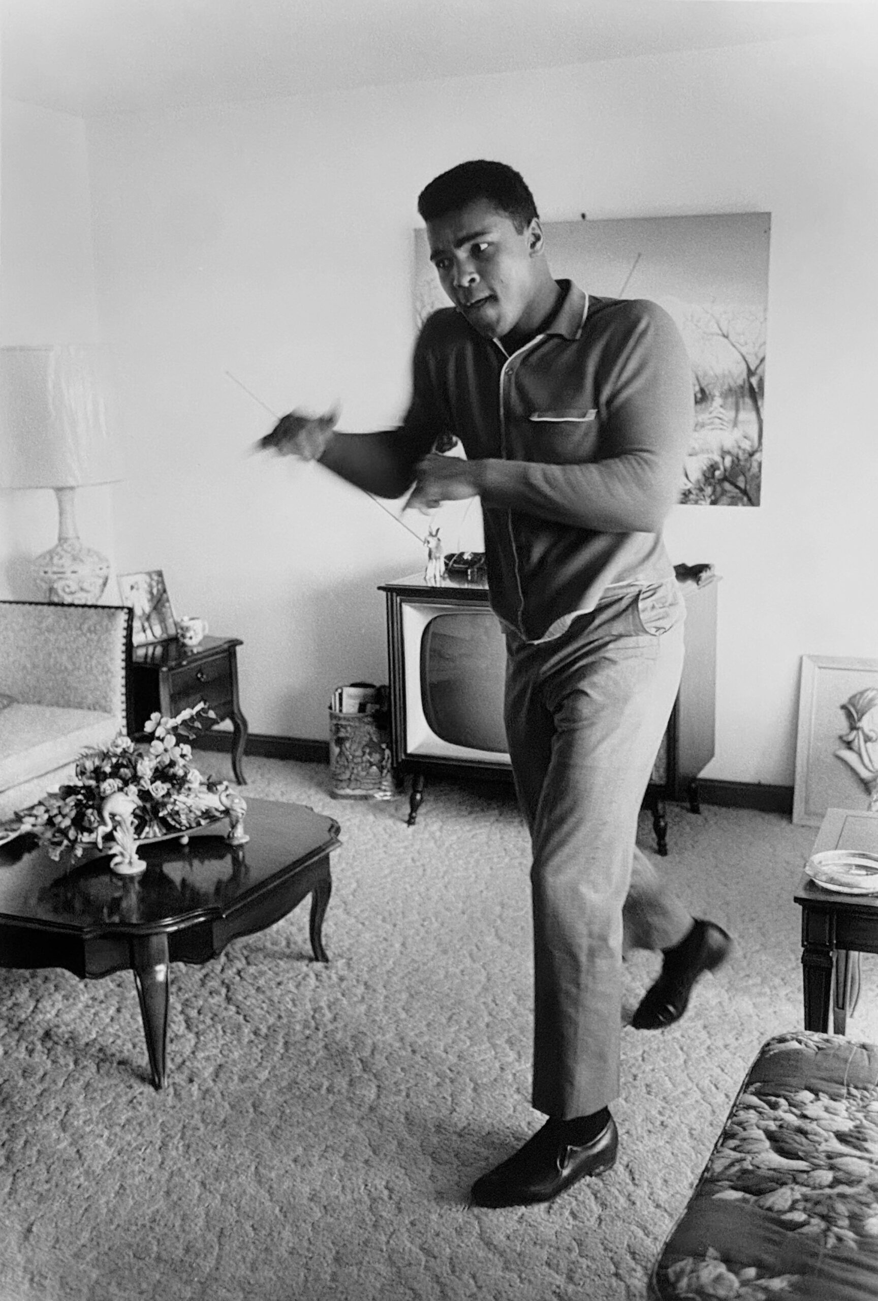 Steve Schapiro: Muhammad Ali Shadow Boxing at Home - CAMERA WORK